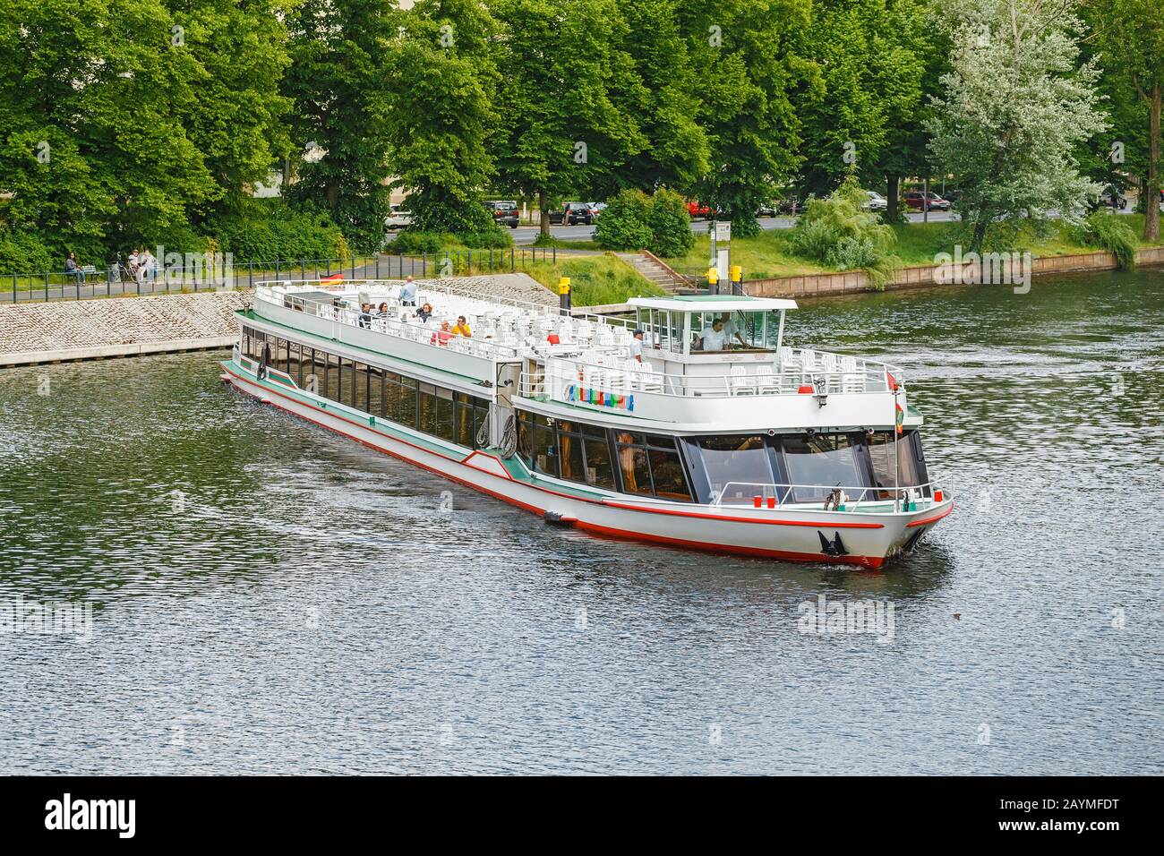 16 MAY 2018, BERLIN, GERMANY: A ferry ship carries passengers and ...