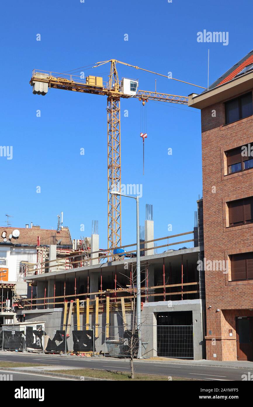 Tower crane at the construction site Stock Photo - Alamy
