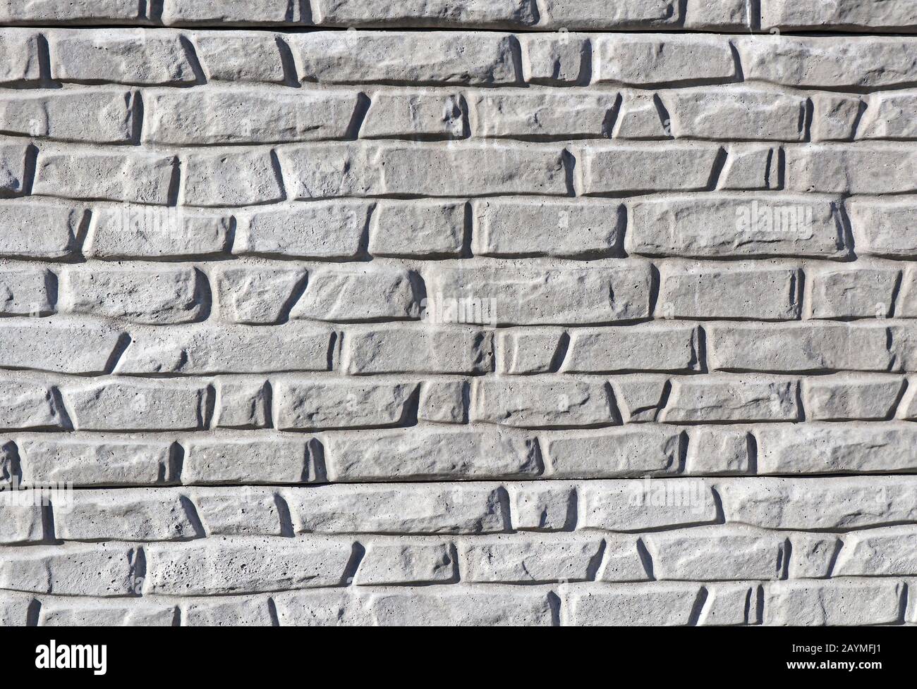 Gray stone wall pattern background Stock Photo - Alamy