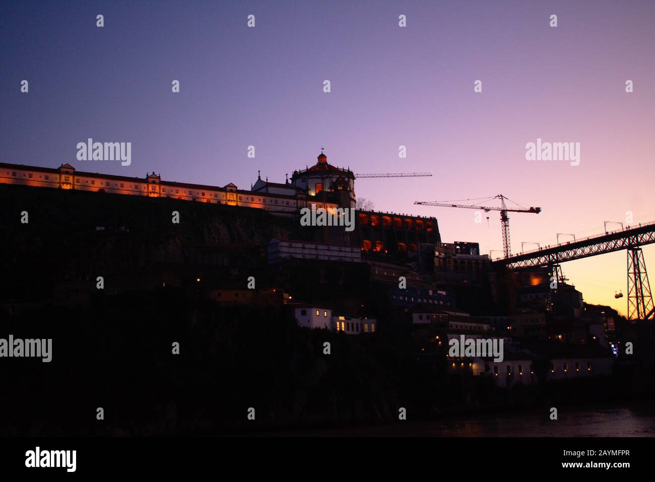Purple sunset along the Duoro river in Porto Stock Photo - Alamy