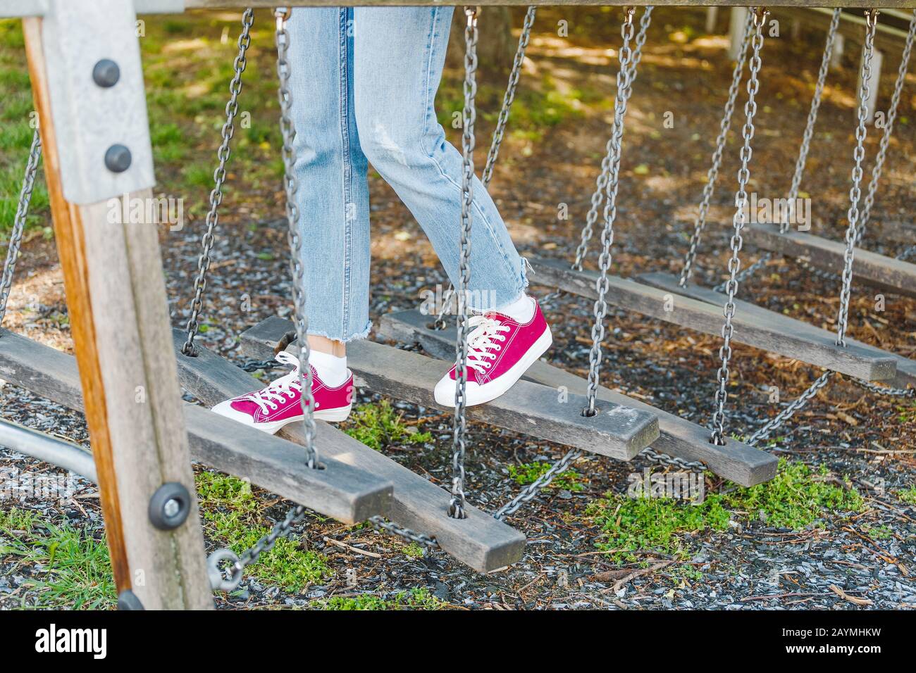 Teenager on high ropes in hi-res stock photography and images - Alamy
