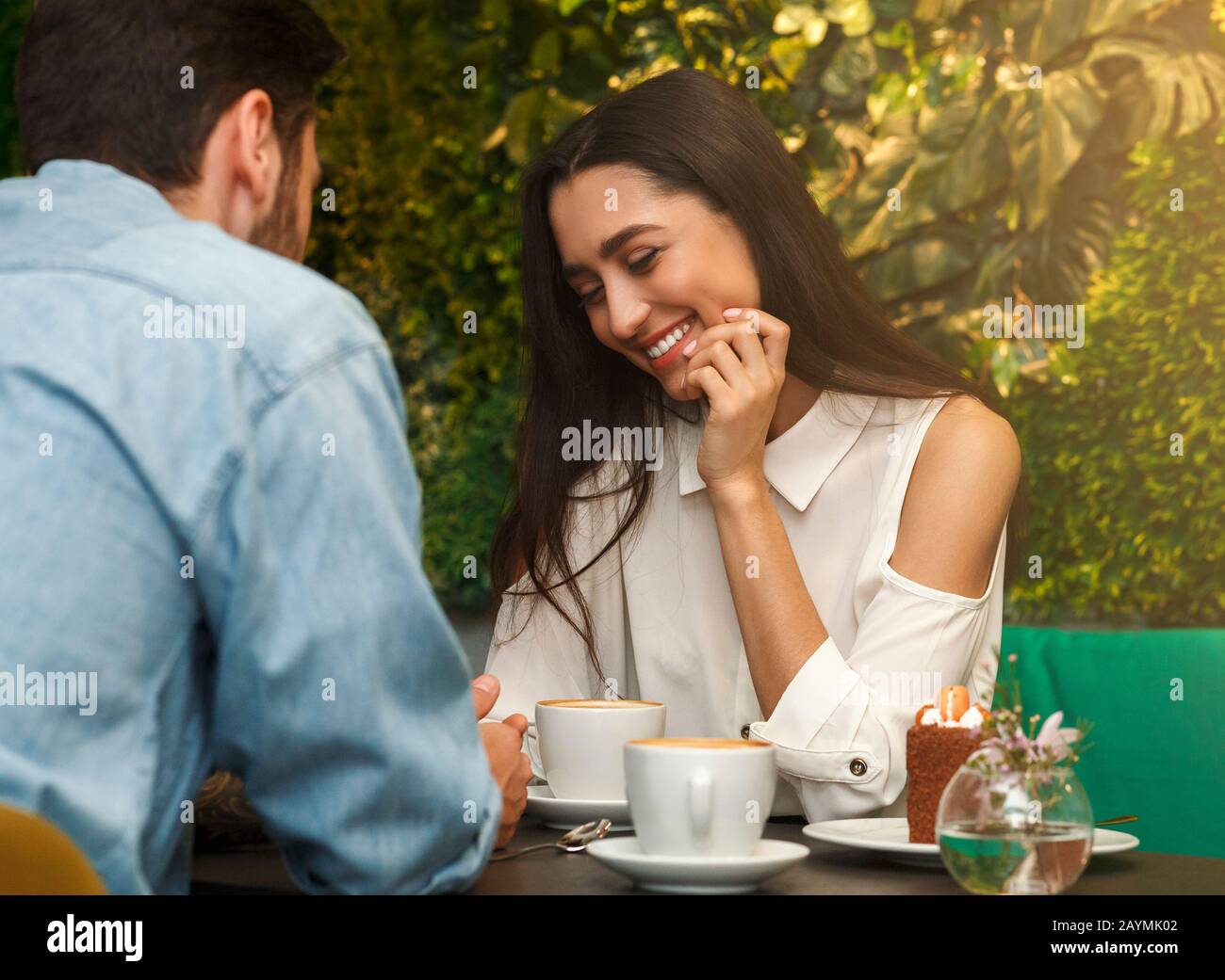 Pretty Girl Laughing Flirting With New Boyfriend In Cafe Stock Photo ...