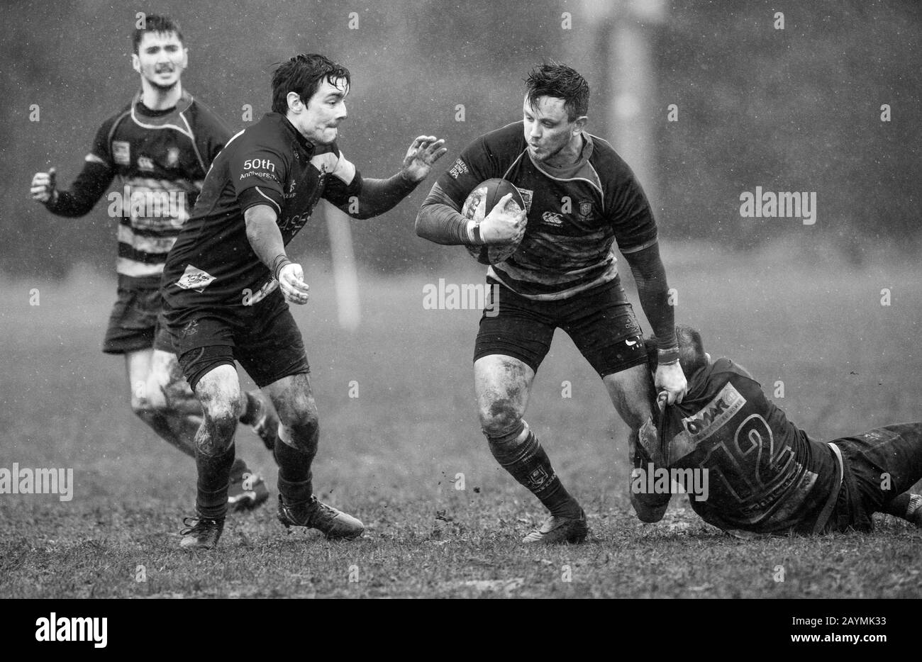 Rugby players tackling Black and White Stock Photos & Images - Alamy