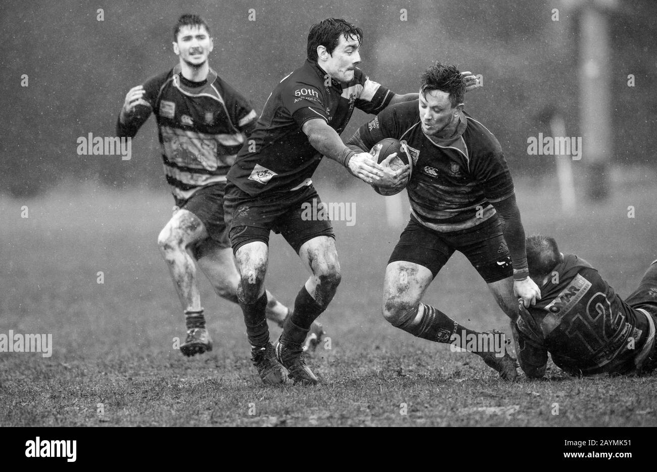 Rugby players tackling Black and White Stock Photos & Images - Alamy