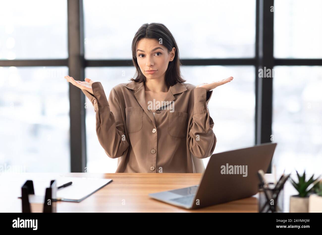 Shoulder shrug hi-res stock photography and images - Alamy