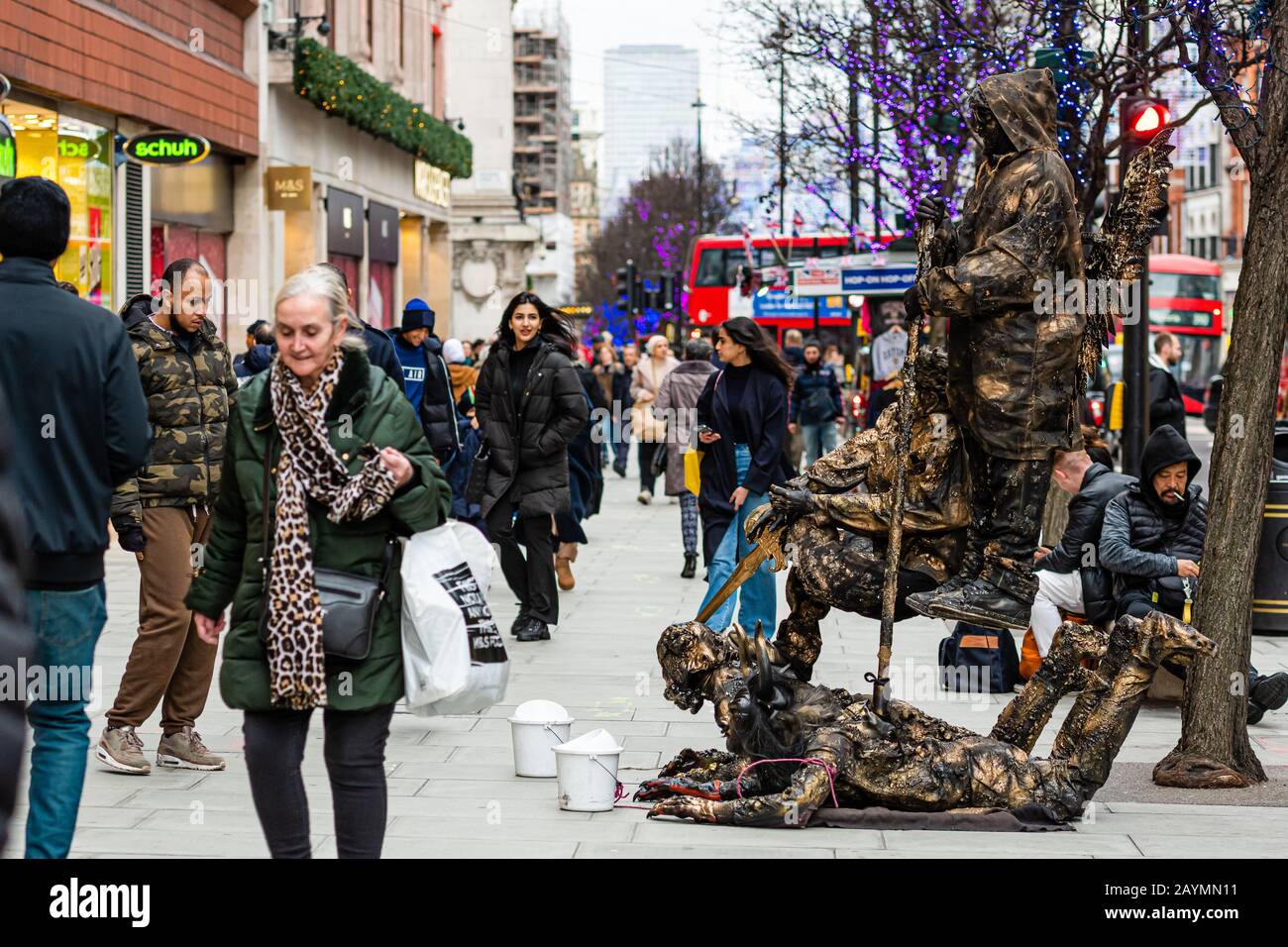 The gold man living statue hi-res stock photography and images - Alamy