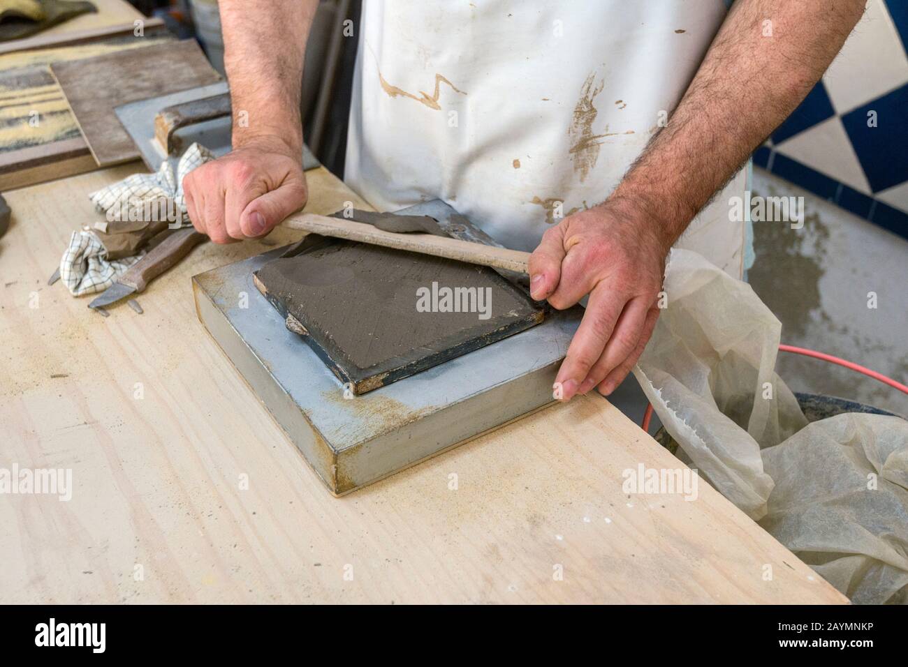 the workshop of Azulejos de Azeitao. reproduces old azulejos on hand ...