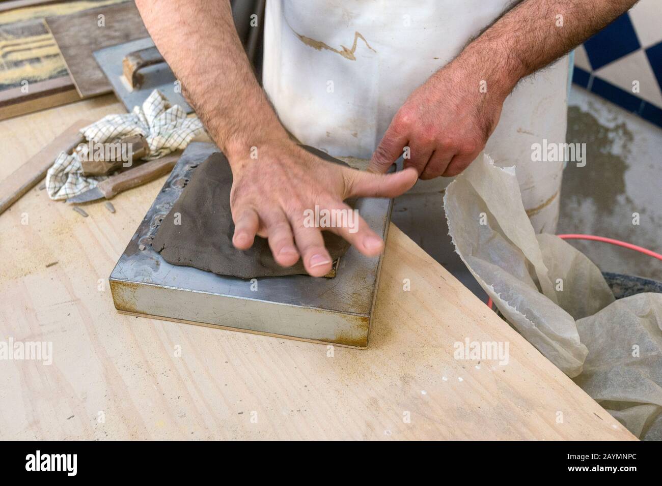 the workshop of Azulejos de Azeitao. reproduces old azulejos on hand ...