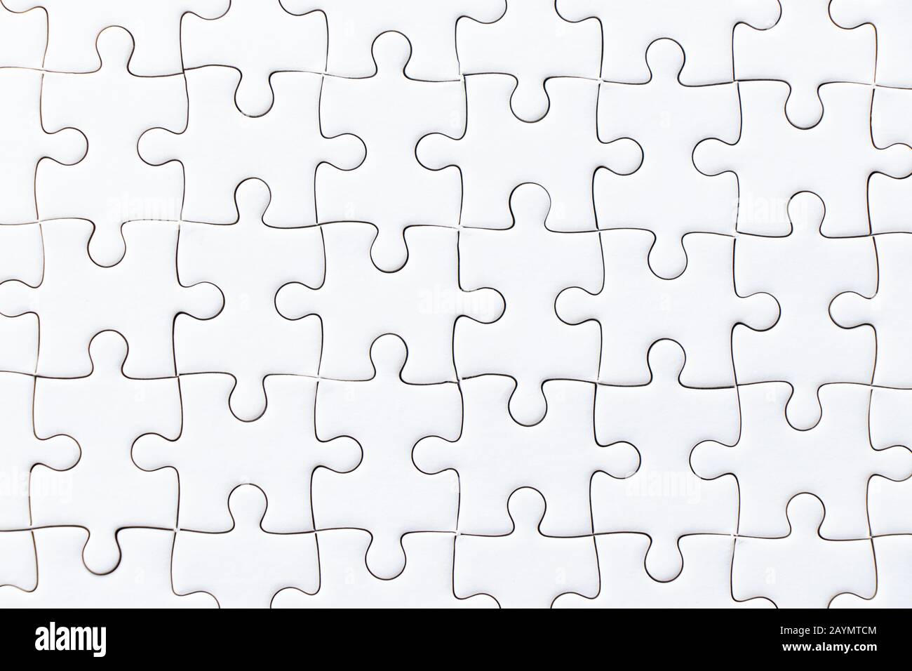 Closed up of white plain jigsaw game background Stock Photo - Alamy