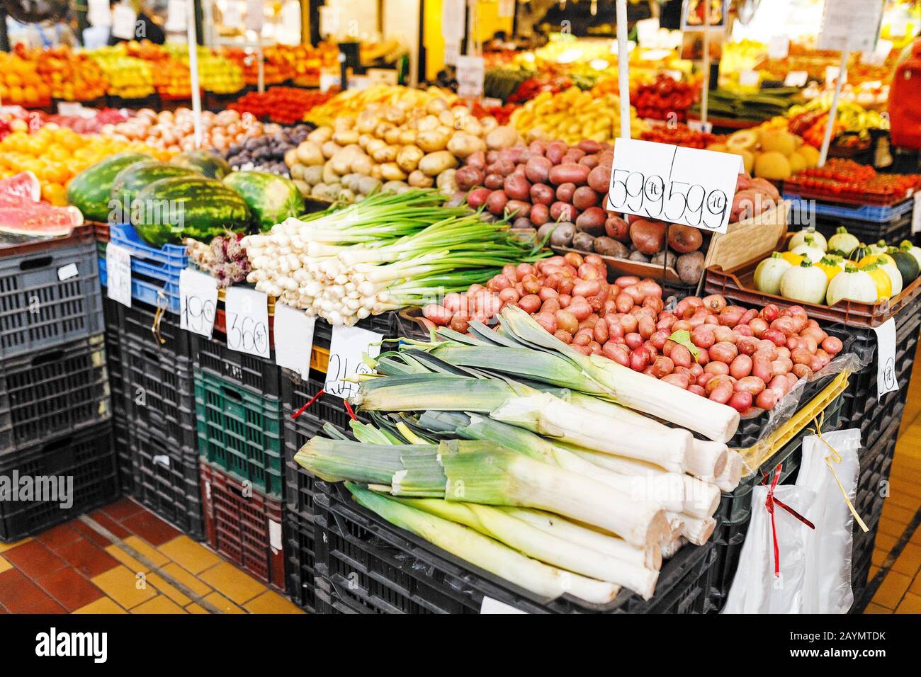 Different vegetables on a stall at the local market Stock Photo - Alamy