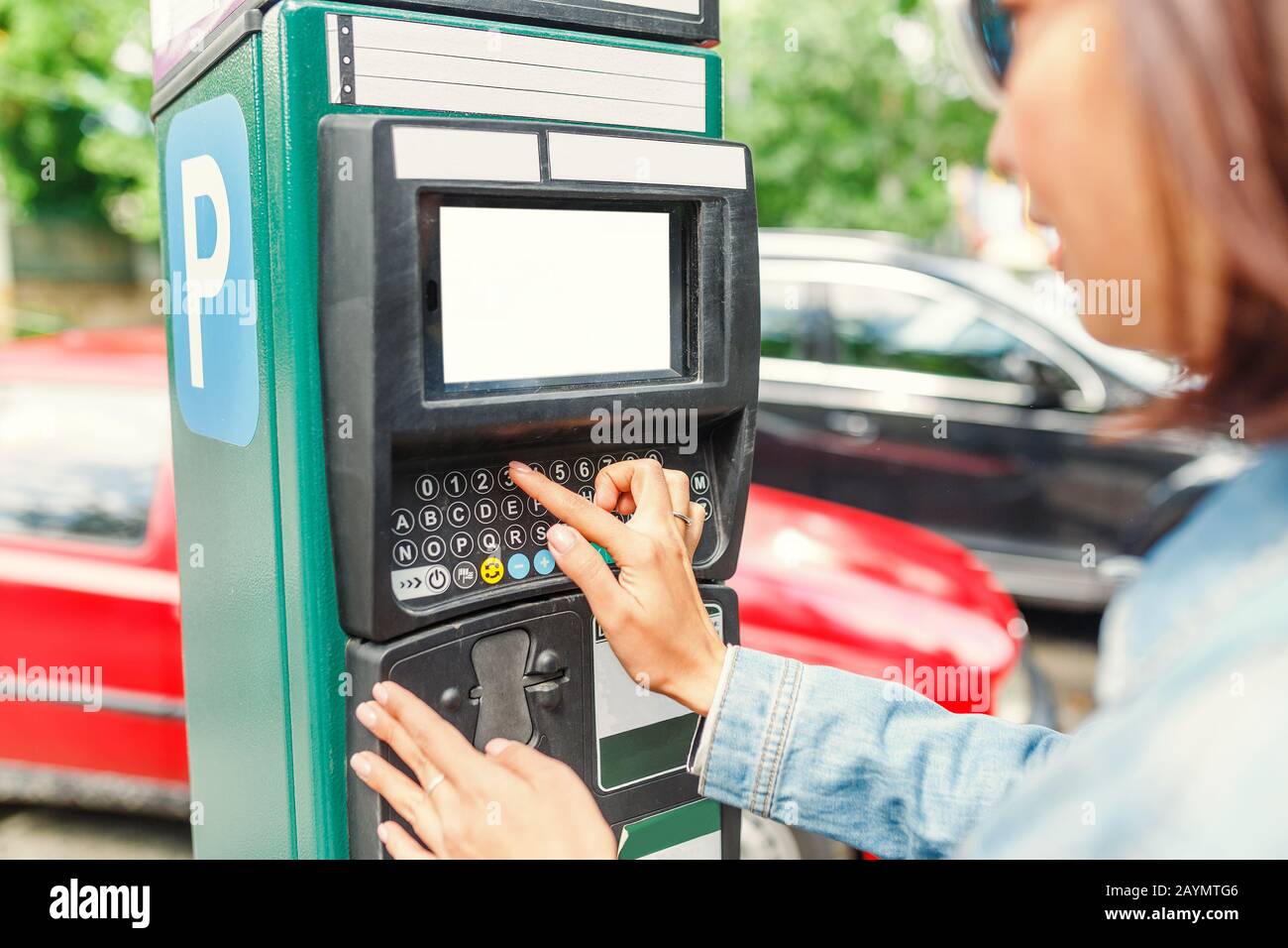 Person using parking meter hi-res stock photography and images - Alamy