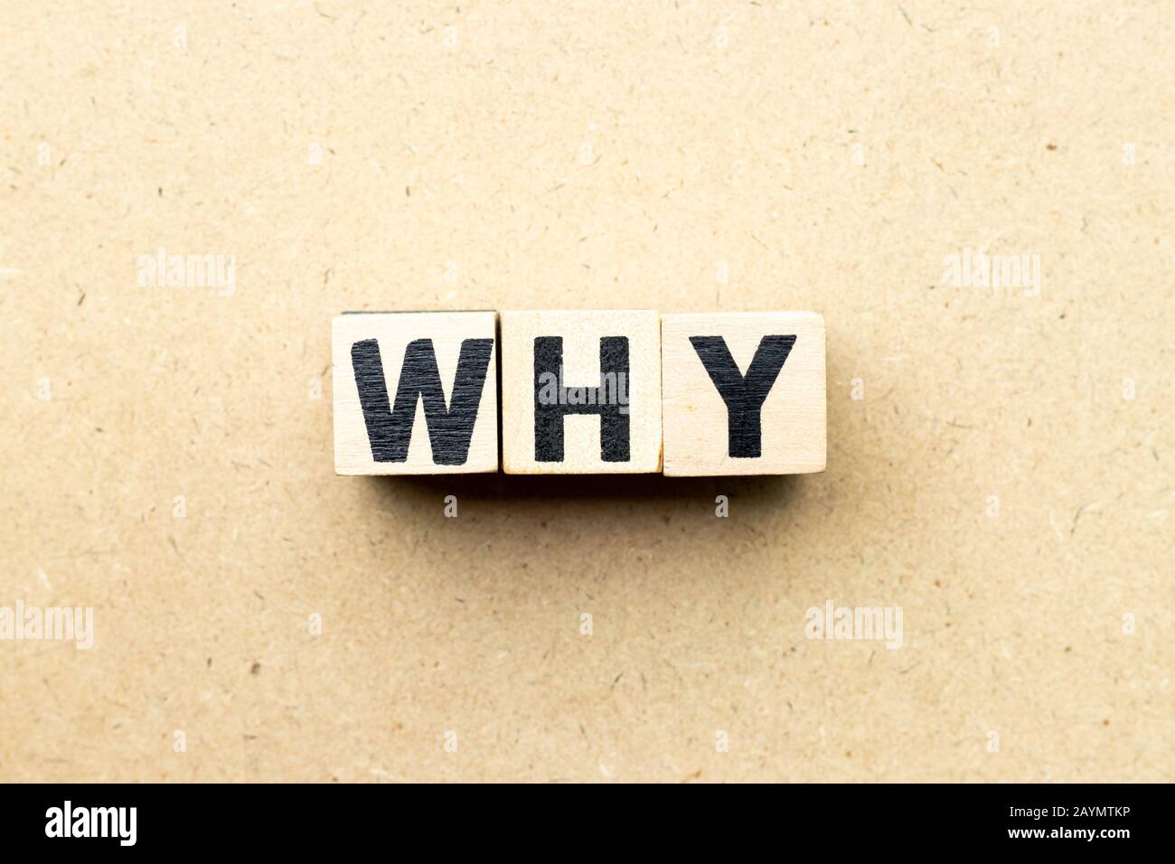 Letter block in word why on wood background Stock Photo - Alamy