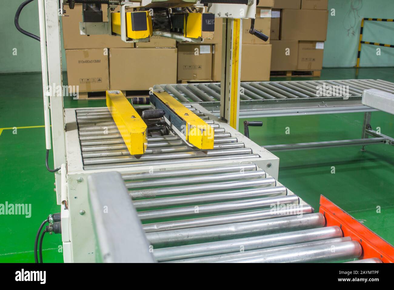 The semi auto taping machine for packing process Stock Photo - Alamy