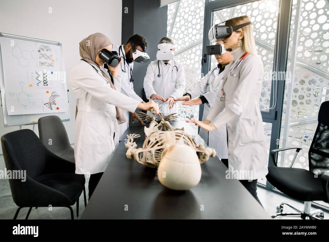 Education, science, vr, medical and health concept. Group of ...