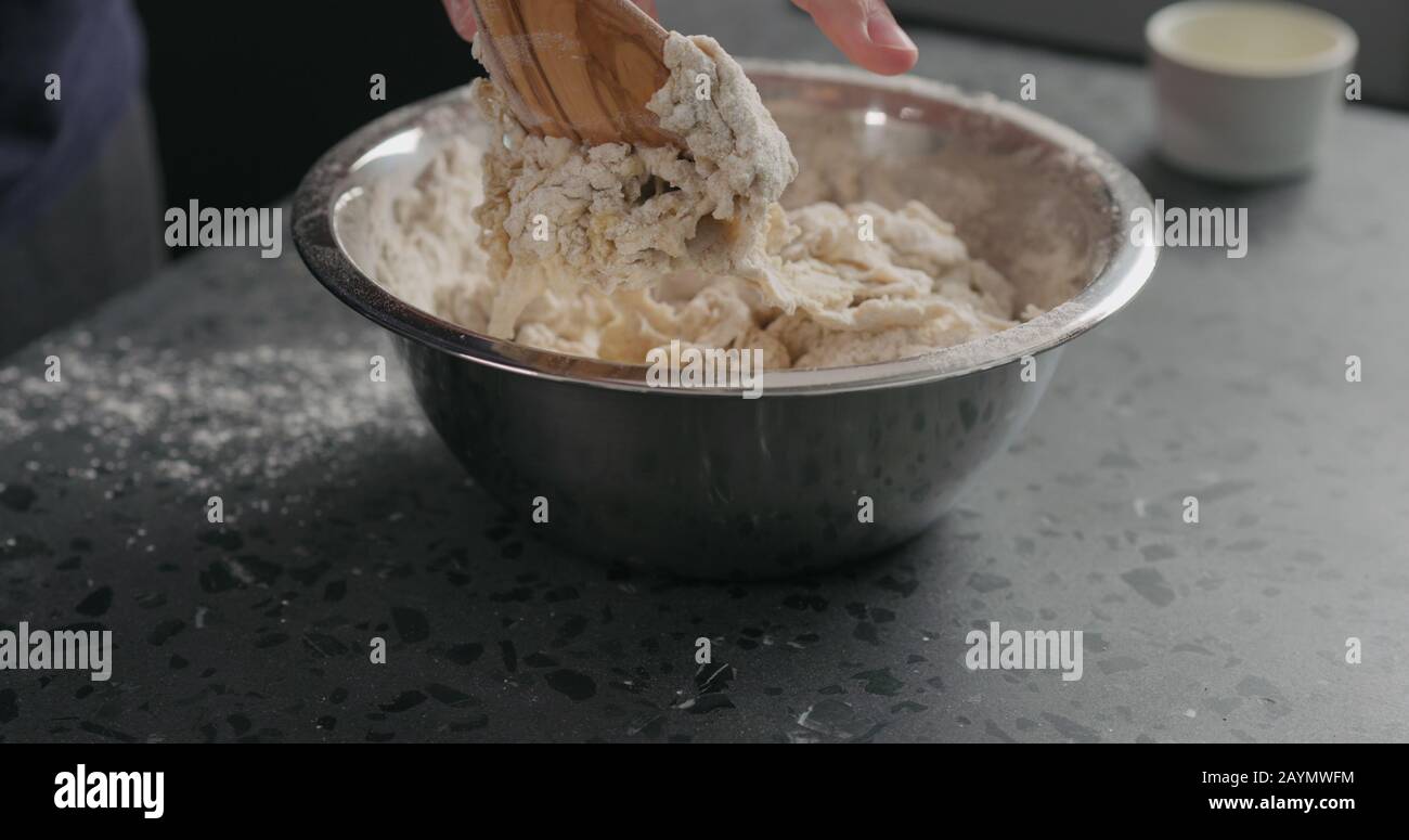 Man mixing wet ingredients hi-res stock photography and images - Alamy