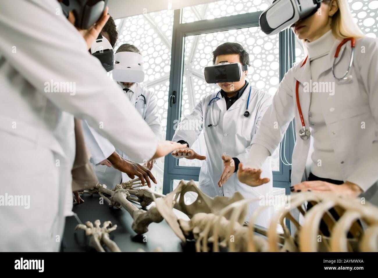 Group of multiethnic scientists, boiengeneers or doctors wearing ...