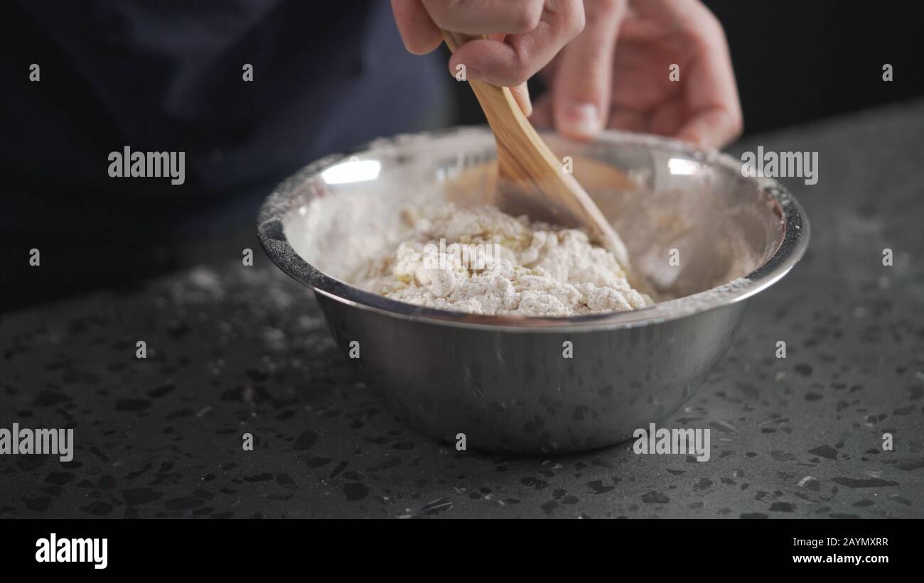 Man stirring yeast into water hi-res stock photography and images - Alamy