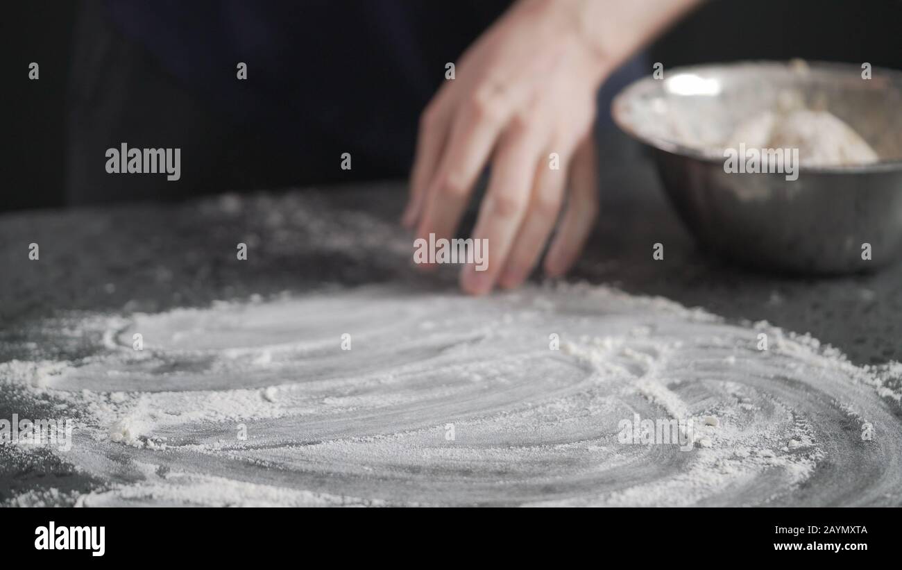 Baker sprinkles dough flour hi-res stock photography and images - Alamy