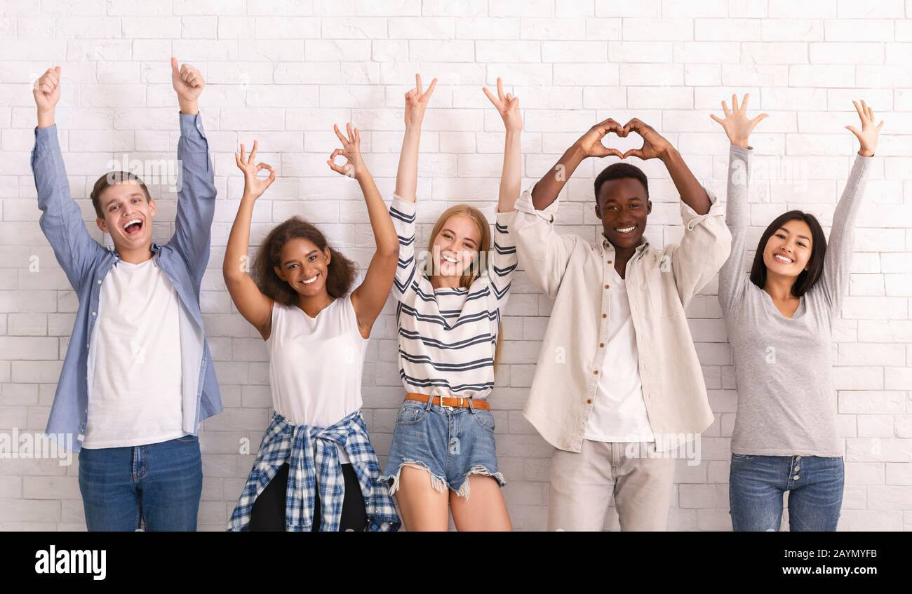 Group of people putting hands up hi-res stock photography and images ...