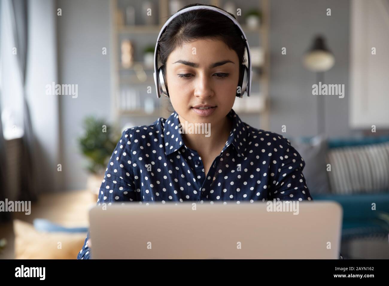 Indian girl studying on laptop hi-res stock photography and images - Alamy