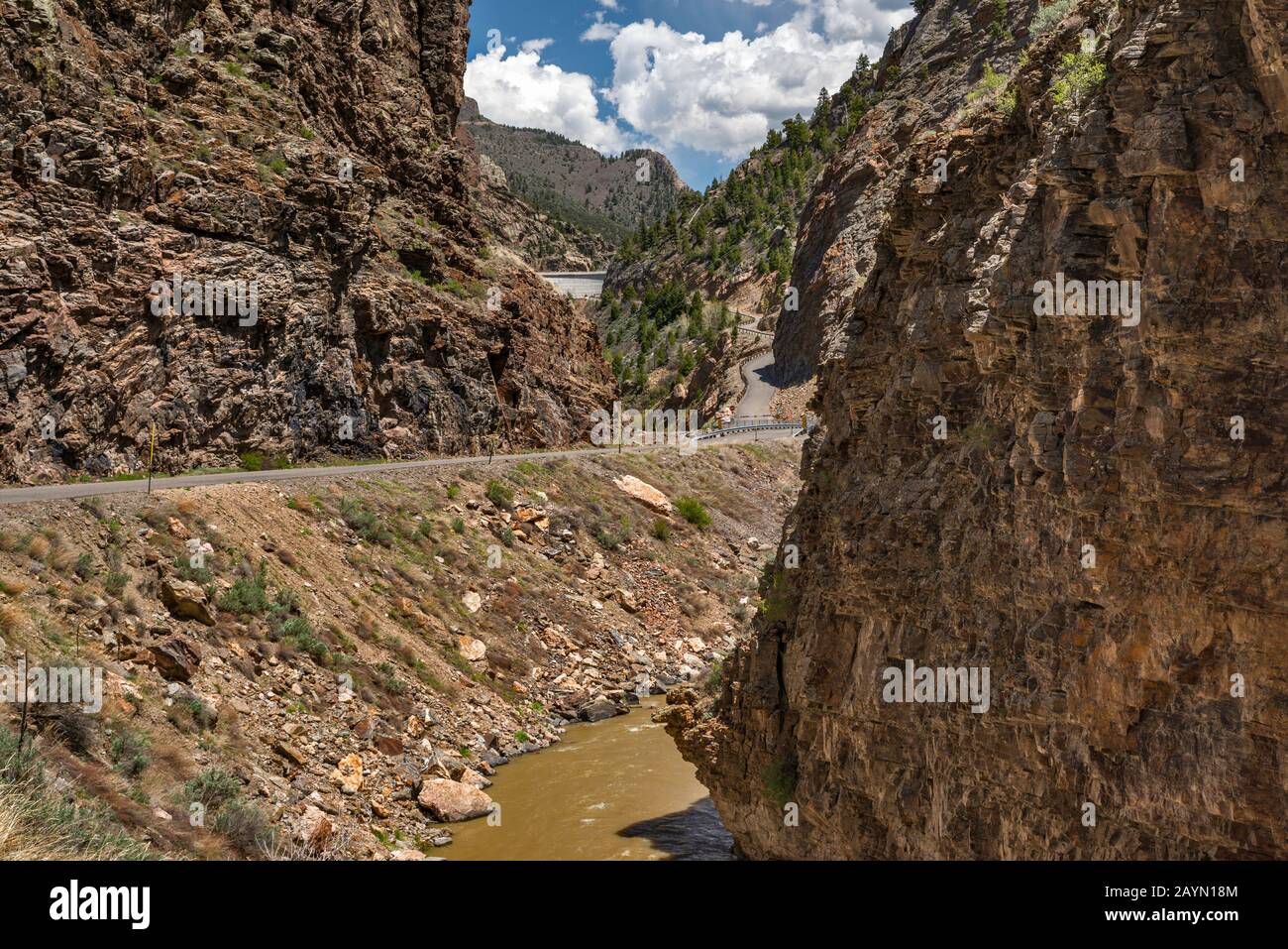 Road to Morrow Point Dam, seen in far distance, on Gunnison River ...