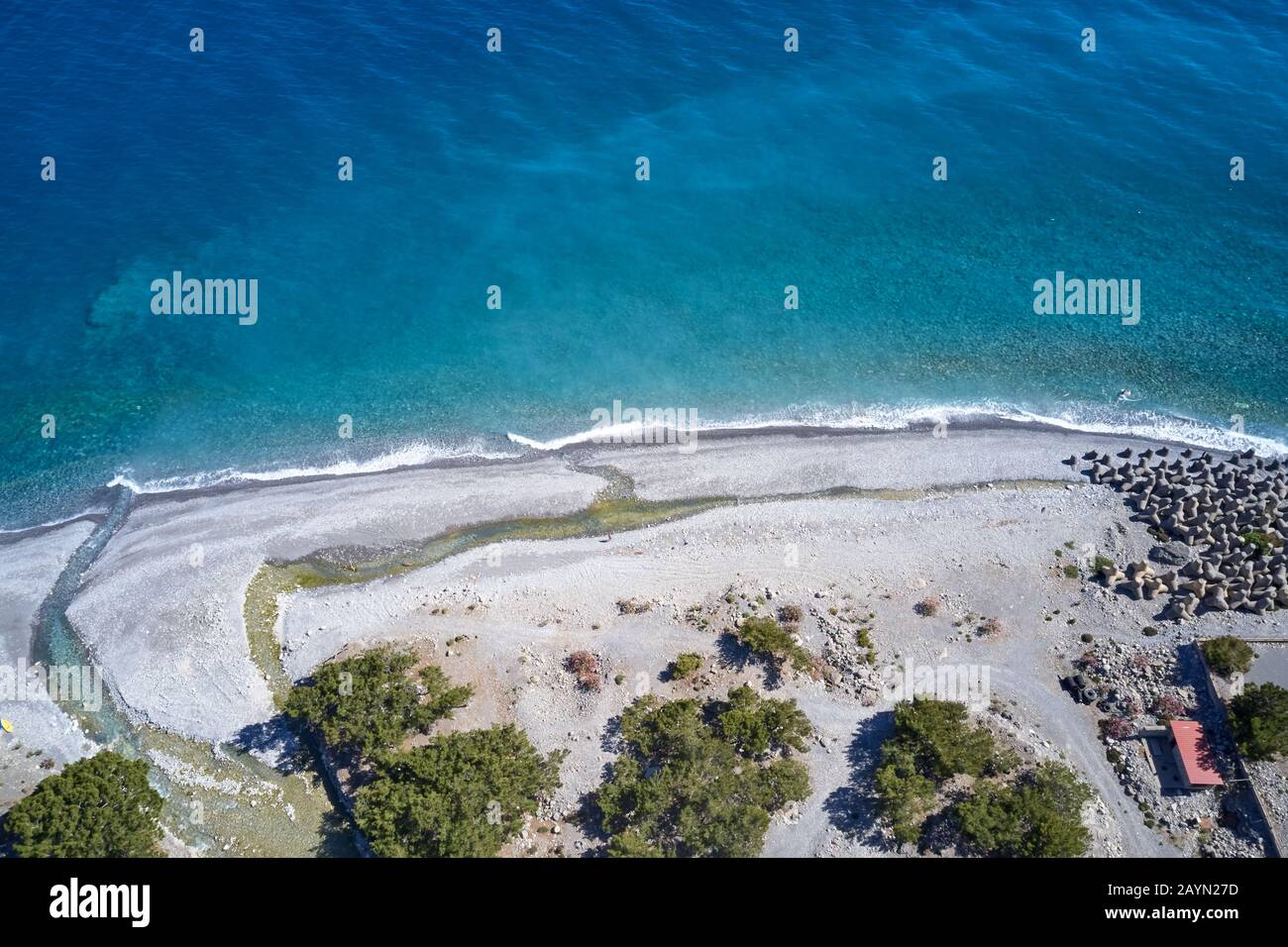 Aerial drone view of Agia Roumeli beach in Chania of Crete, Greece. The ...