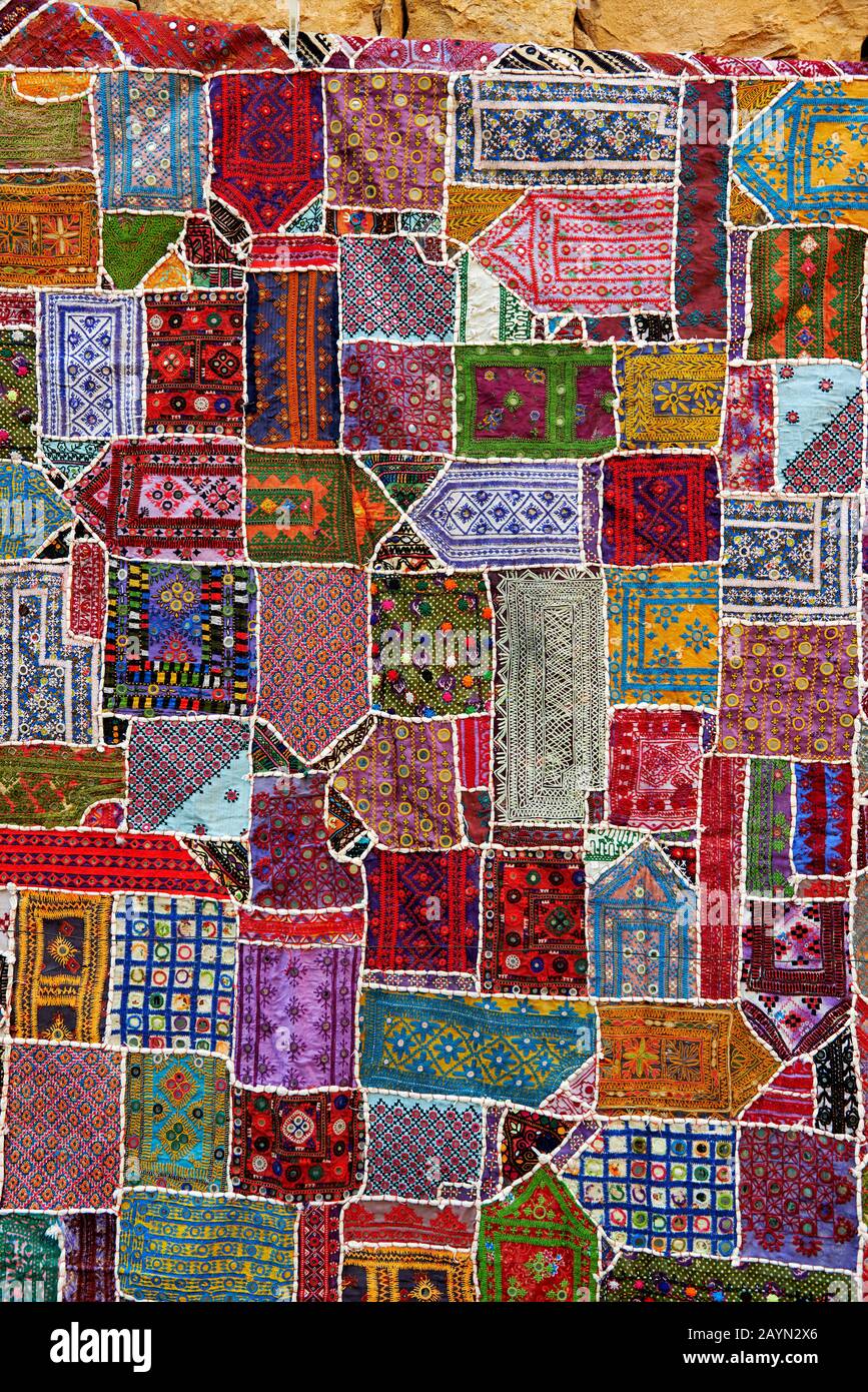 colorful pattern of different pieces of textiles in Jaisalmer ...