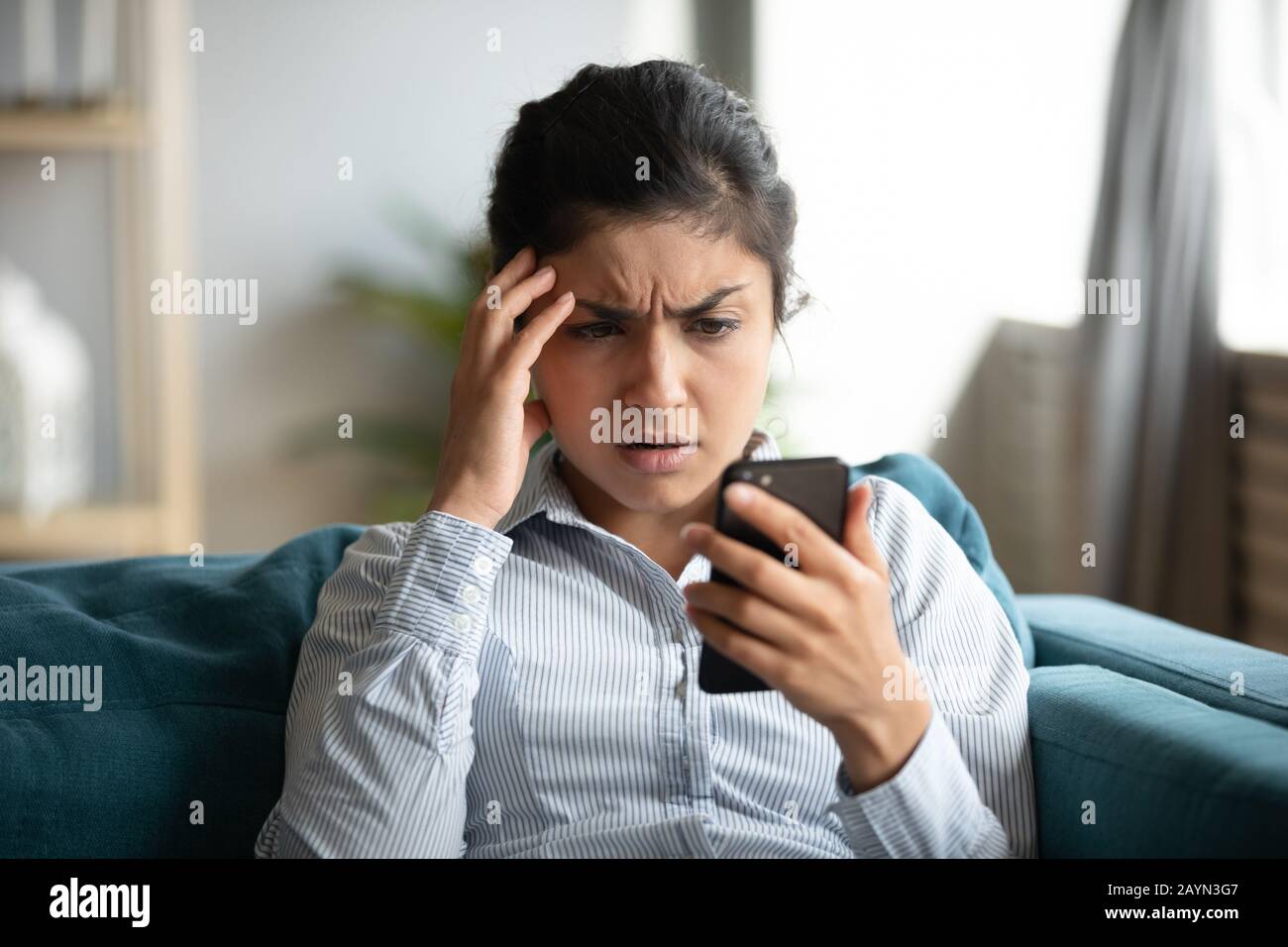 Frustrated girl feel stressed with cellphone problems Stock Photo - Alamy