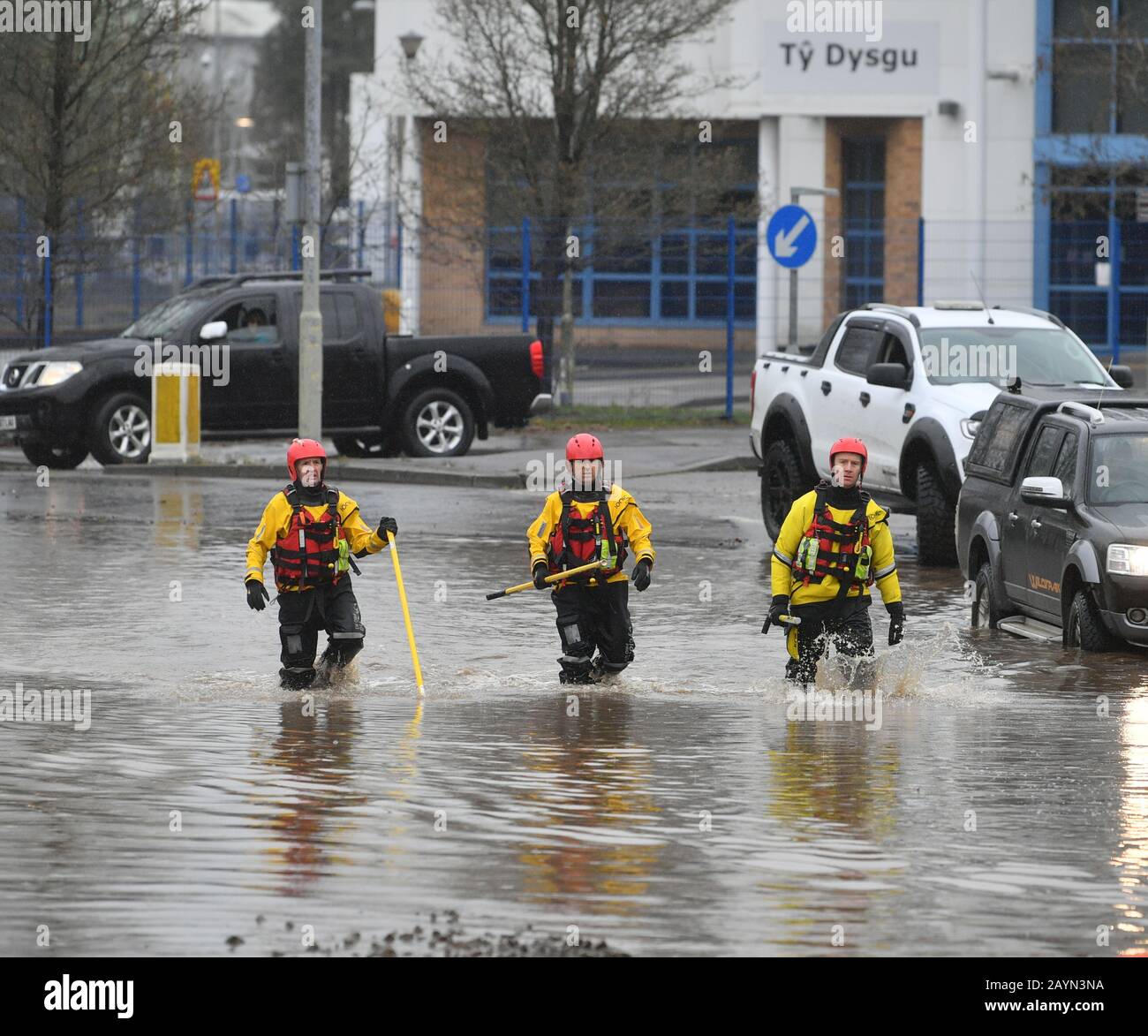 Fire service personnel continue rescue operations after flooding in ...