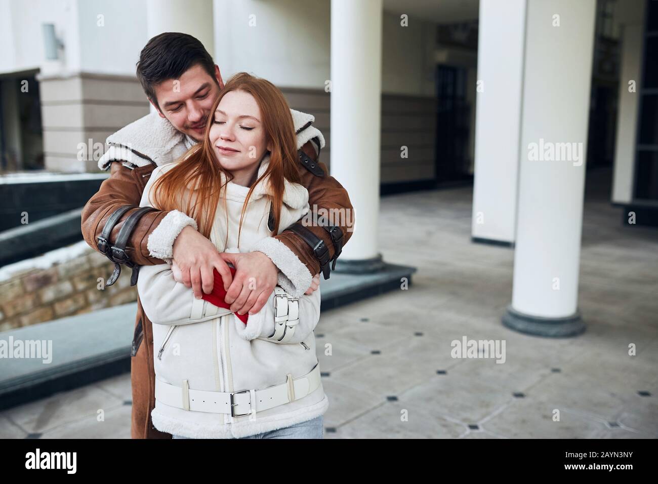 amorous couple flirting in the street. care concept. I love you ...