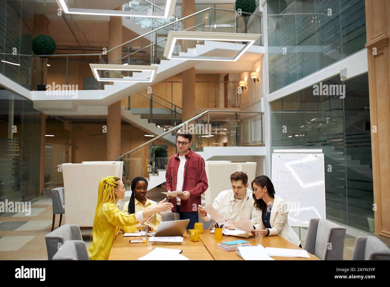 Woman giving advice to co worker hi-res stock photography and images ...