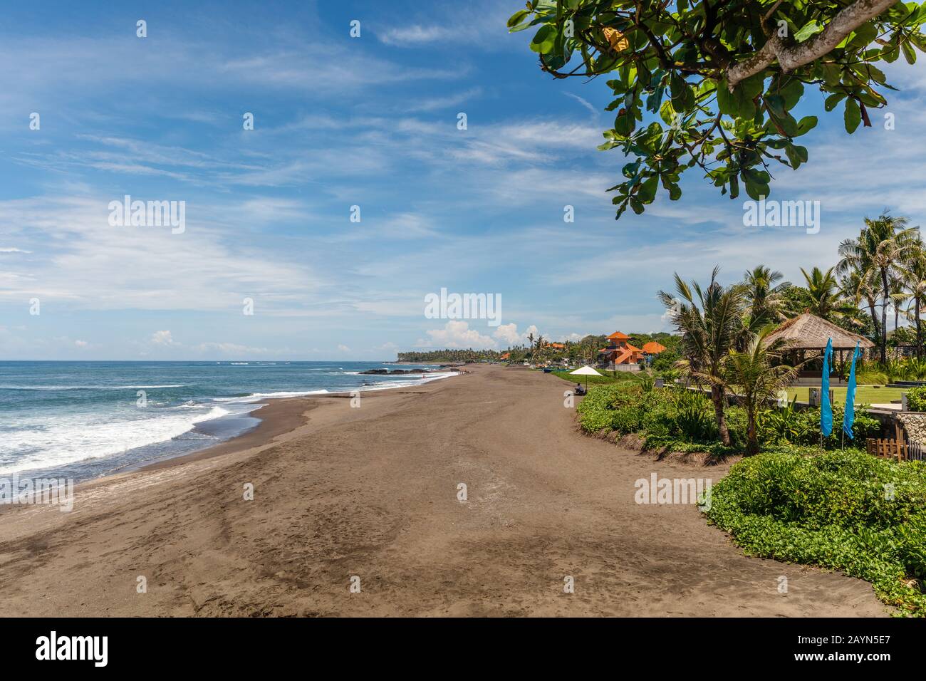 View of Pantai Babadan (Babadan beach), Bali, Indonesia. Volcanic black ...