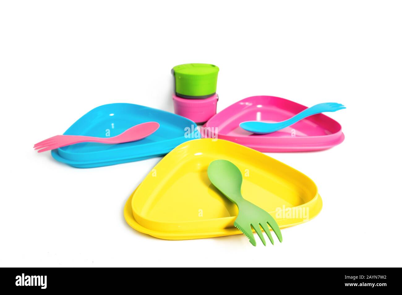 Set of colorful plastic dishes isolated on white background. Vibrant ...