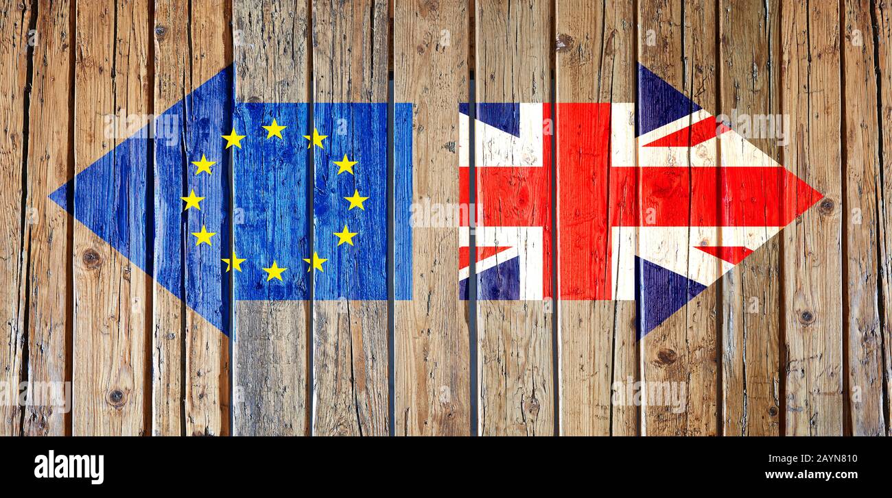 Two arrows with flags painting on wooden fence. Brexit concept Stock ...