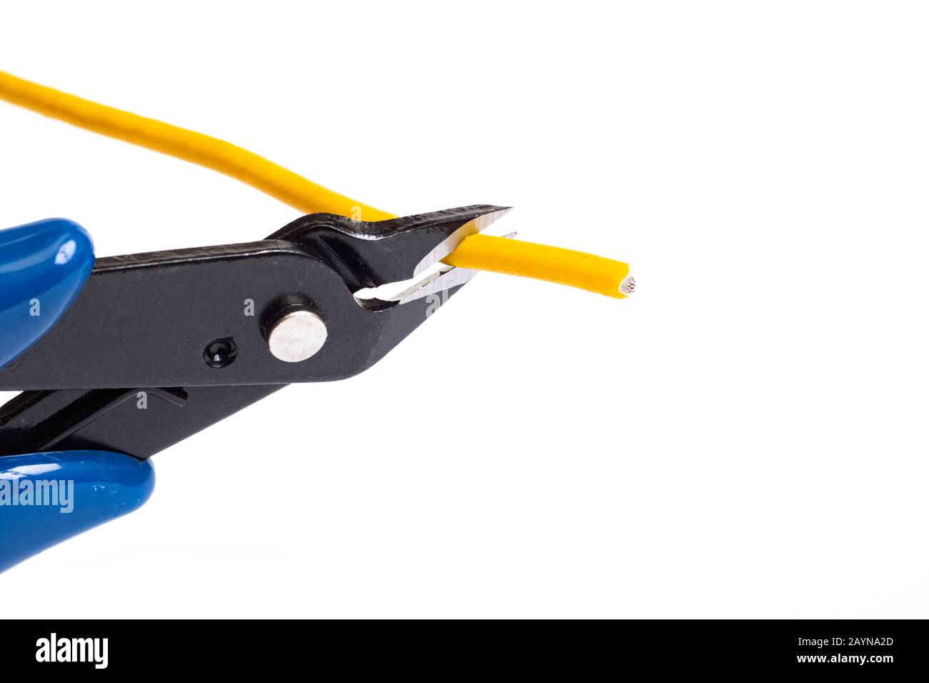Blue wire cutter cuts yellow wire isolated on white background Stock ...