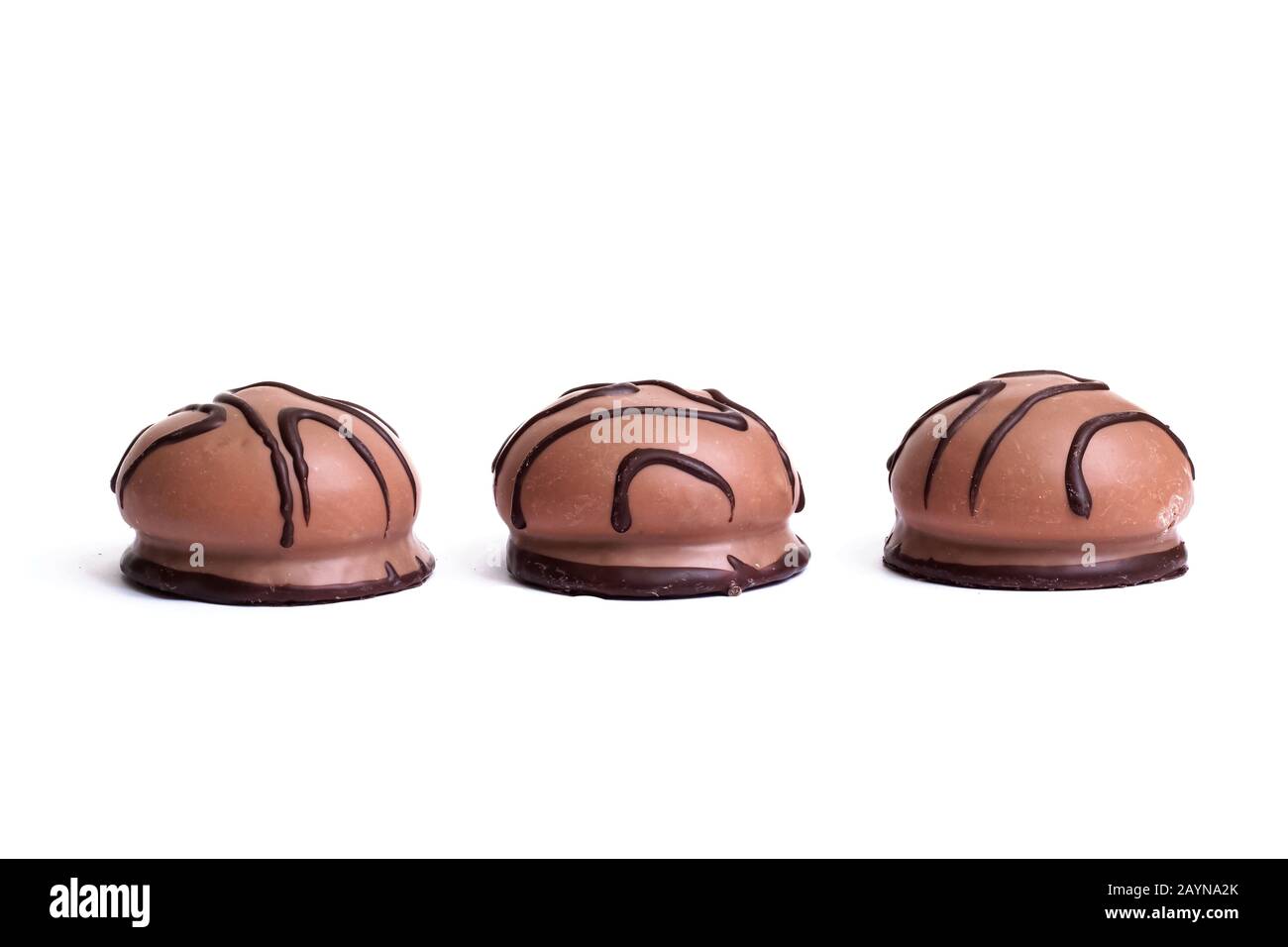 Three cookies in chocolate isolated on white background Stock Photo - Alamy