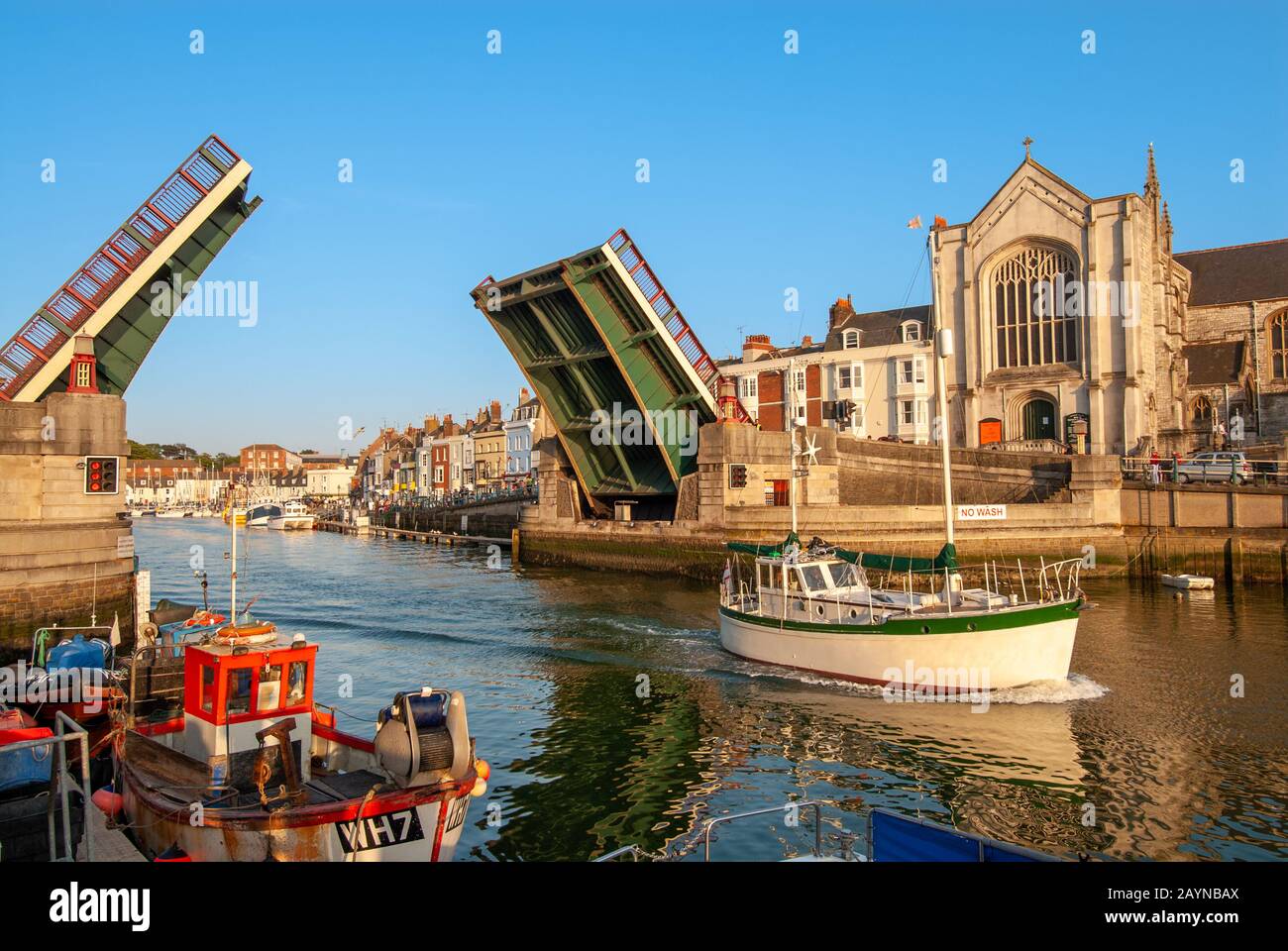 Boat passing bridge in port hi-res stock photography and images - Alamy