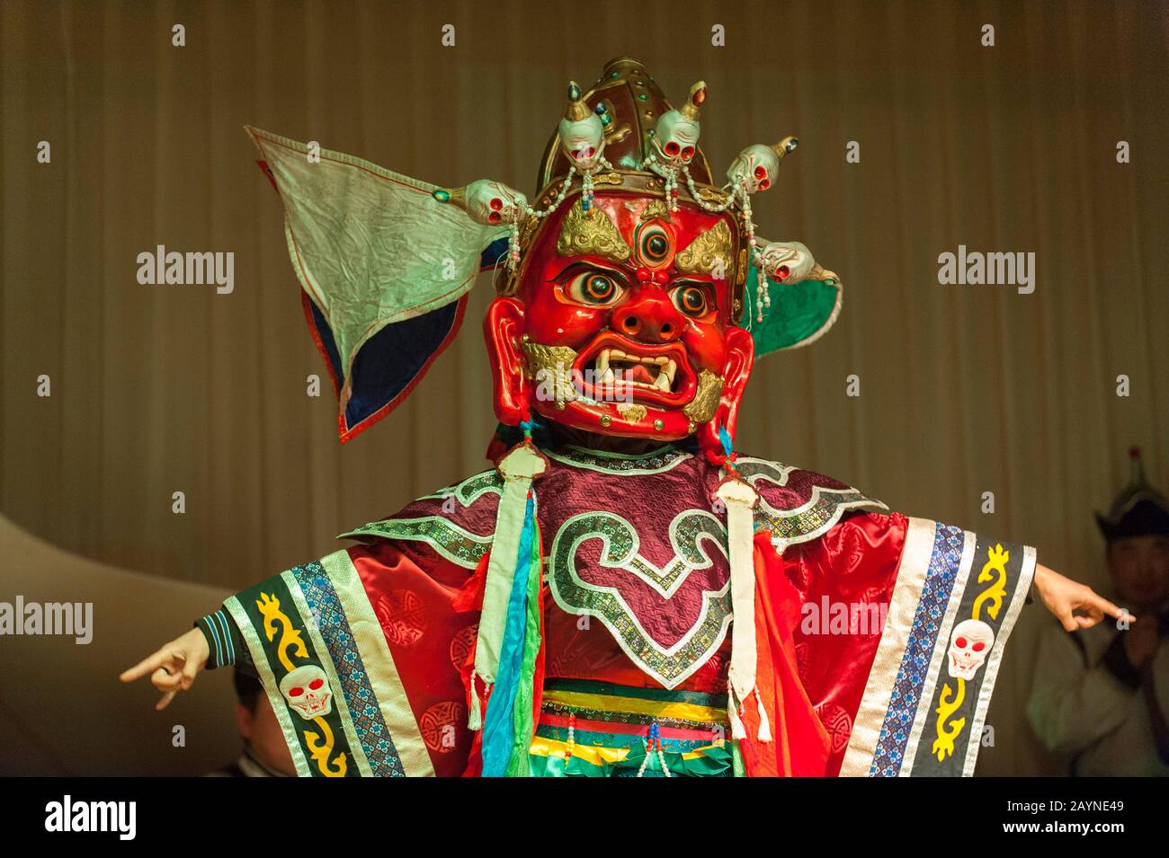 A dancer with a traditional mask during a cultural performance in ...