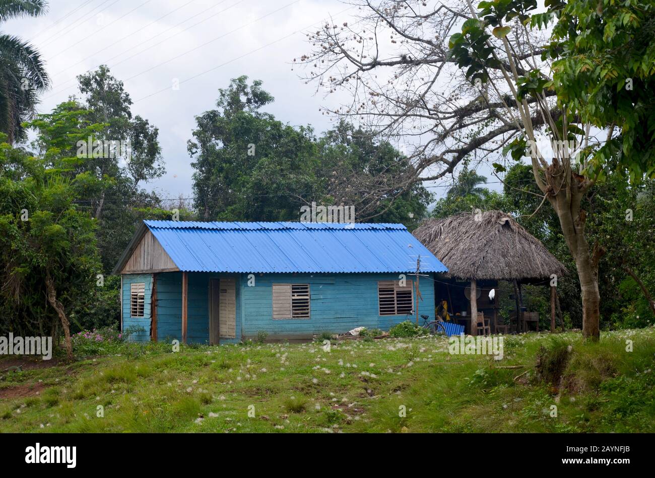 Traditional rural dwellings near the village of Guisa, at the foothills ...