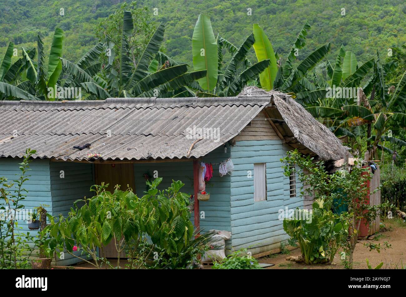 Traditional rural dwellings near the village of Guisa, at the foothills ...