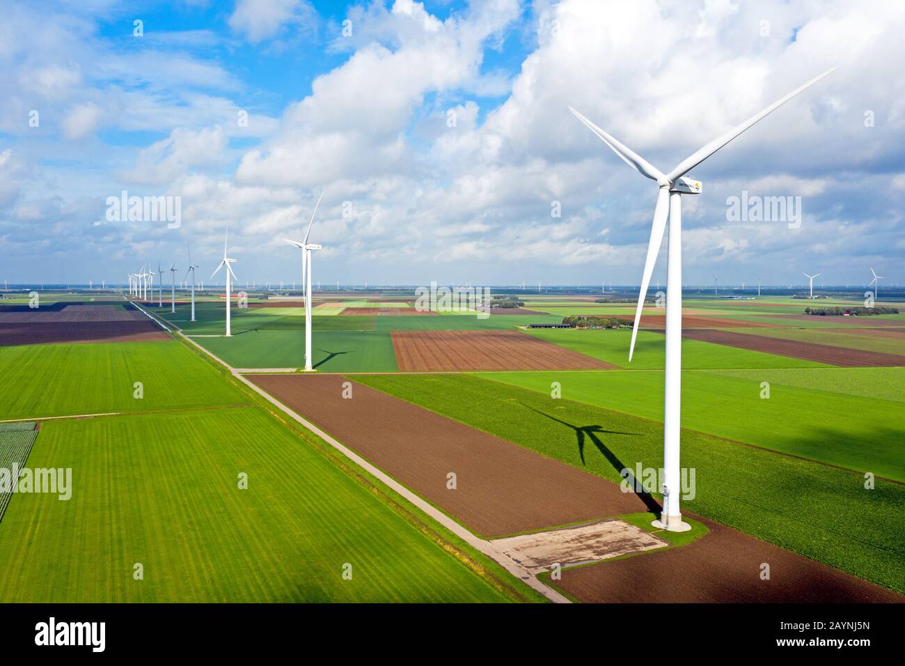 Aerial from a dutch landscape with windturbines, meadows and beautiful ...