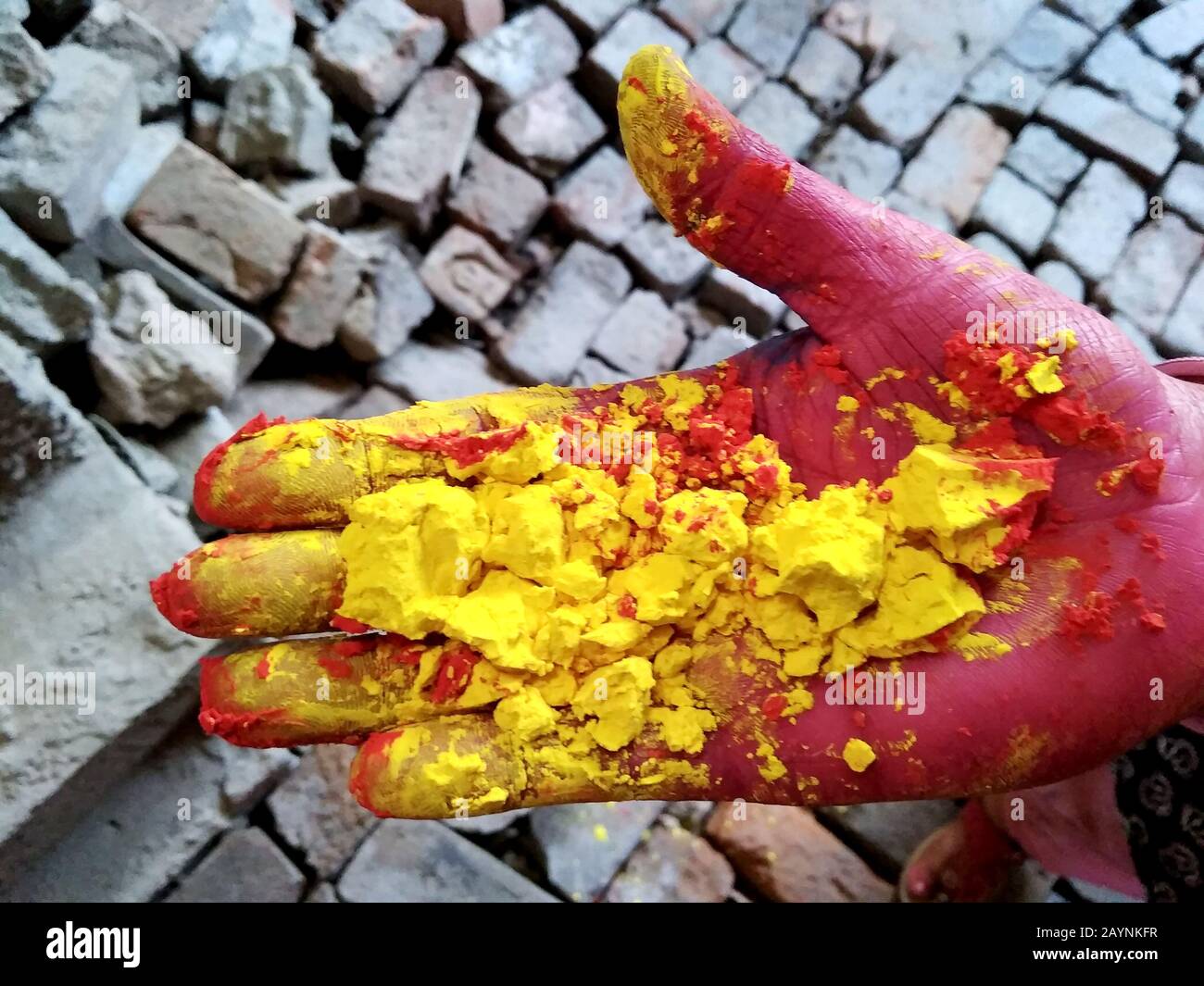 Female hands holding dry color powder Stock Photo - Alamy