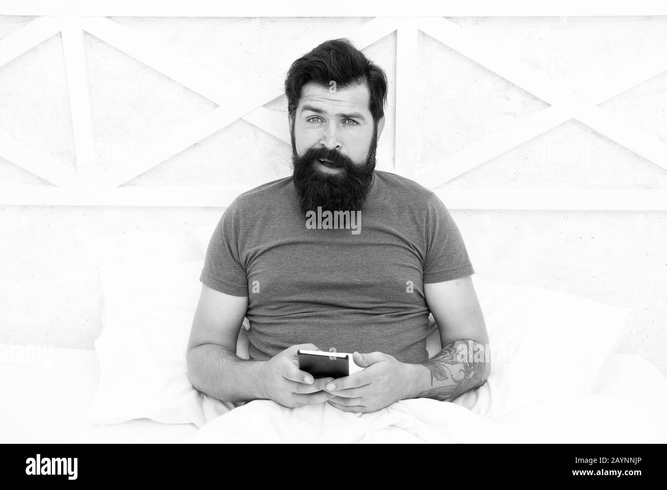 Checking social networks. Cellular communication. Modern guy talking on ...