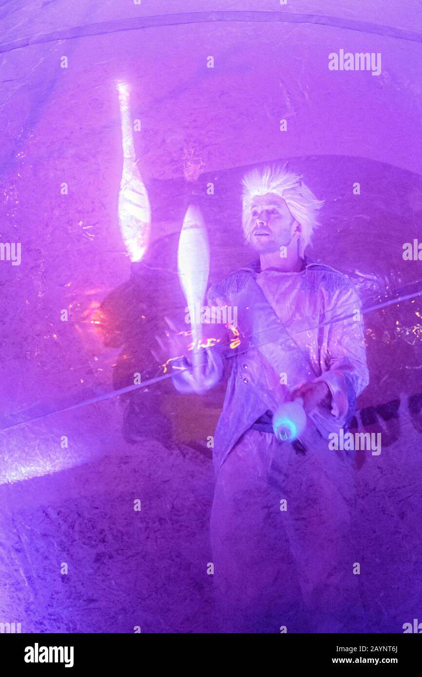 Juggler dressed in period costume at the Calgary Winter (Glow) Festival ...