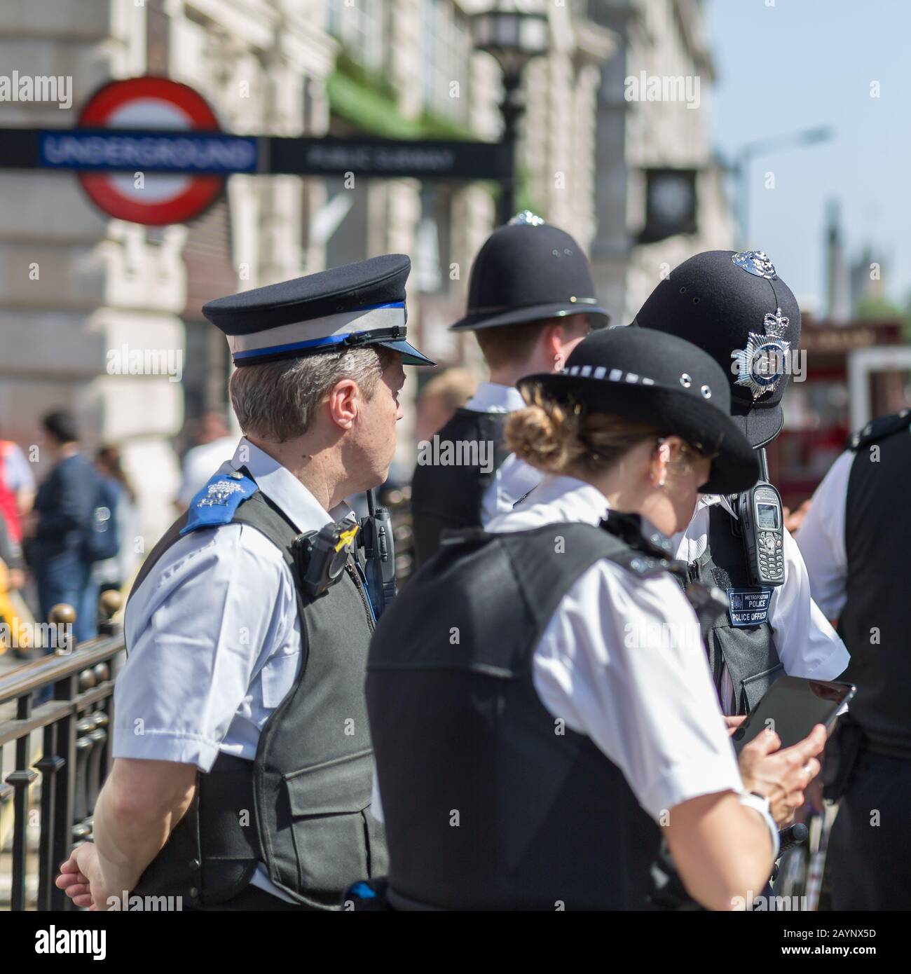 Street Photography: Group of London Policemen with Their Uniform Stock ...