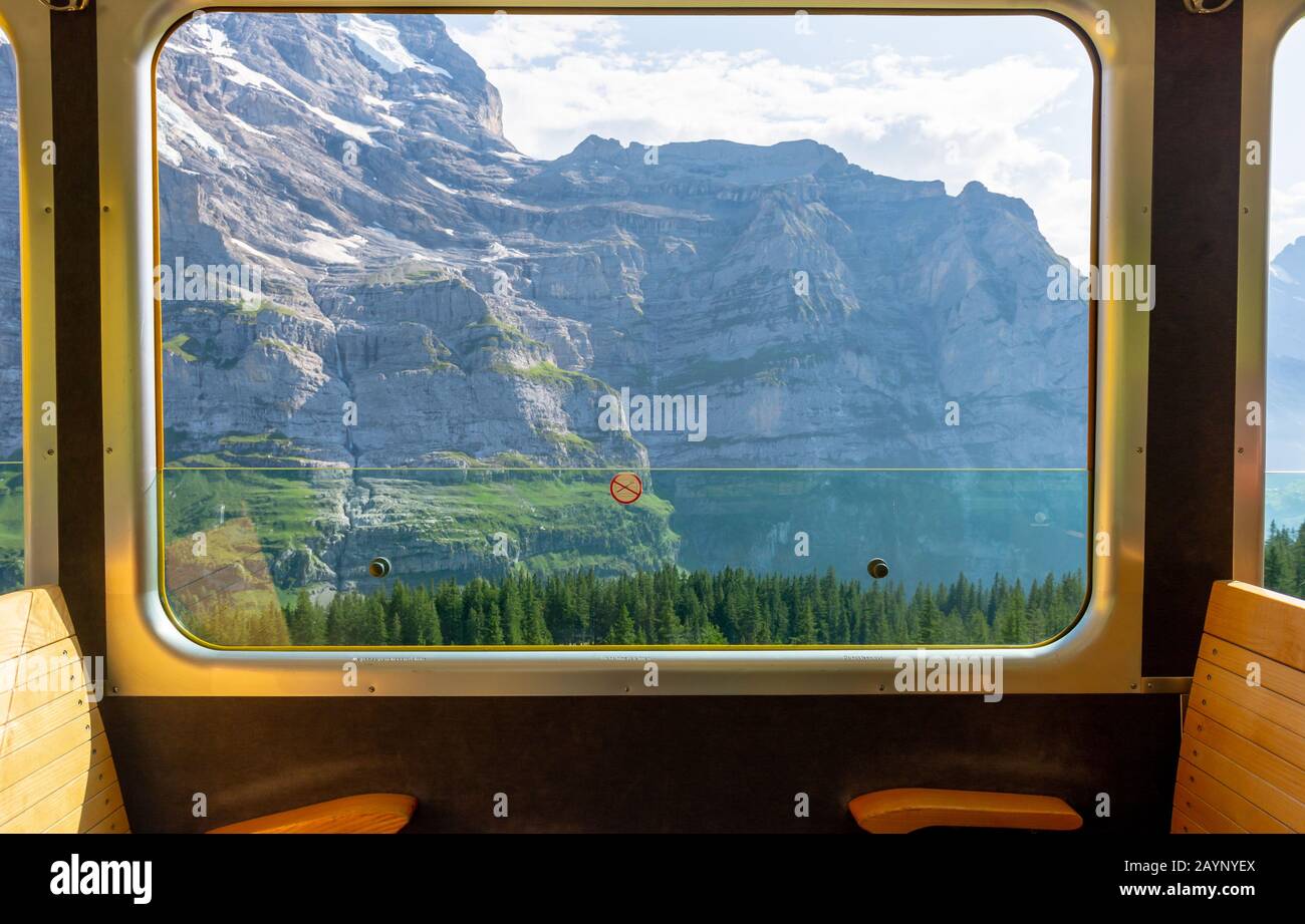 Beautiful Swiss Alps views on the yellow train of the Wengernalp ...