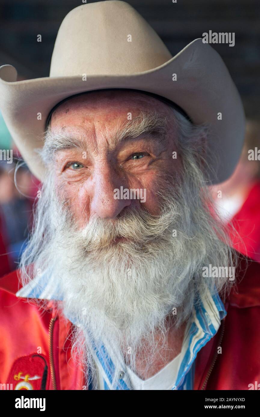 Portrait of an senior man with beard and cowboy hat in the Palouse near ...