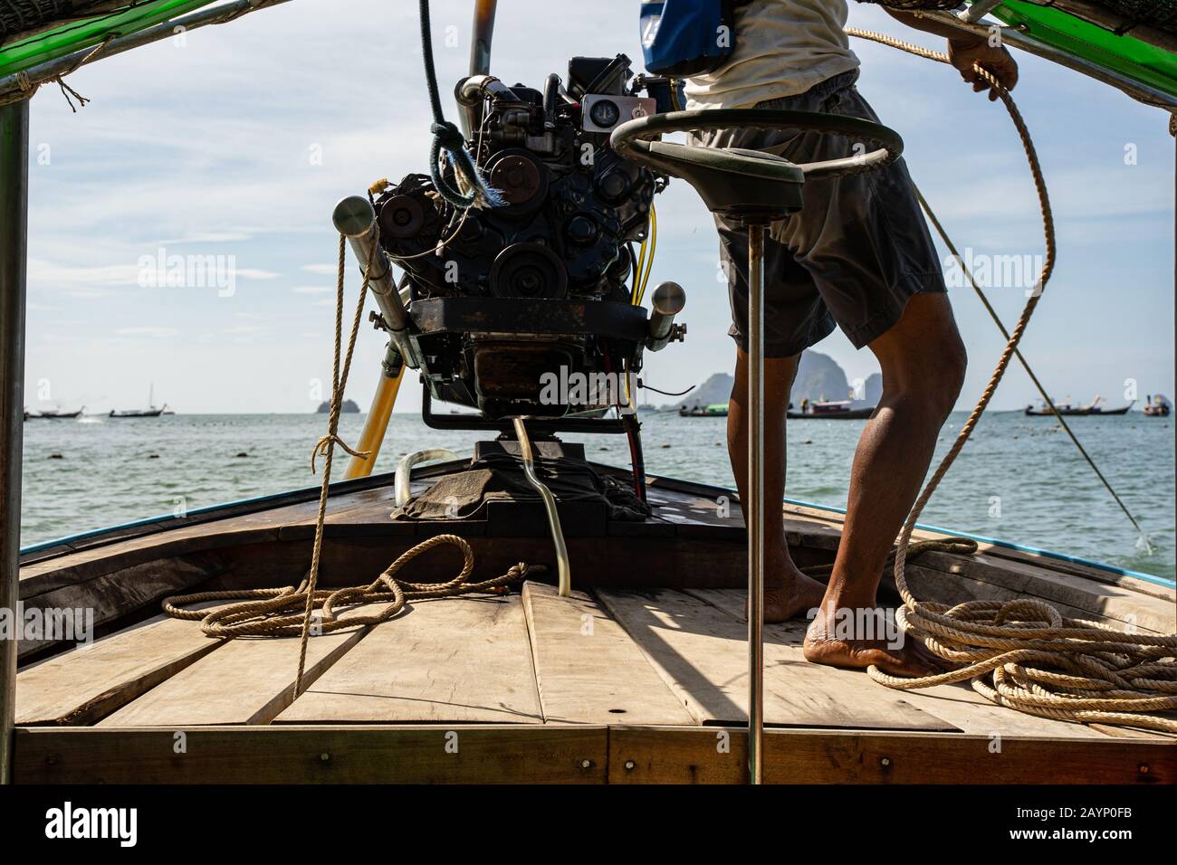 Close up of strong man that being on boat Stock Photo - Alamy