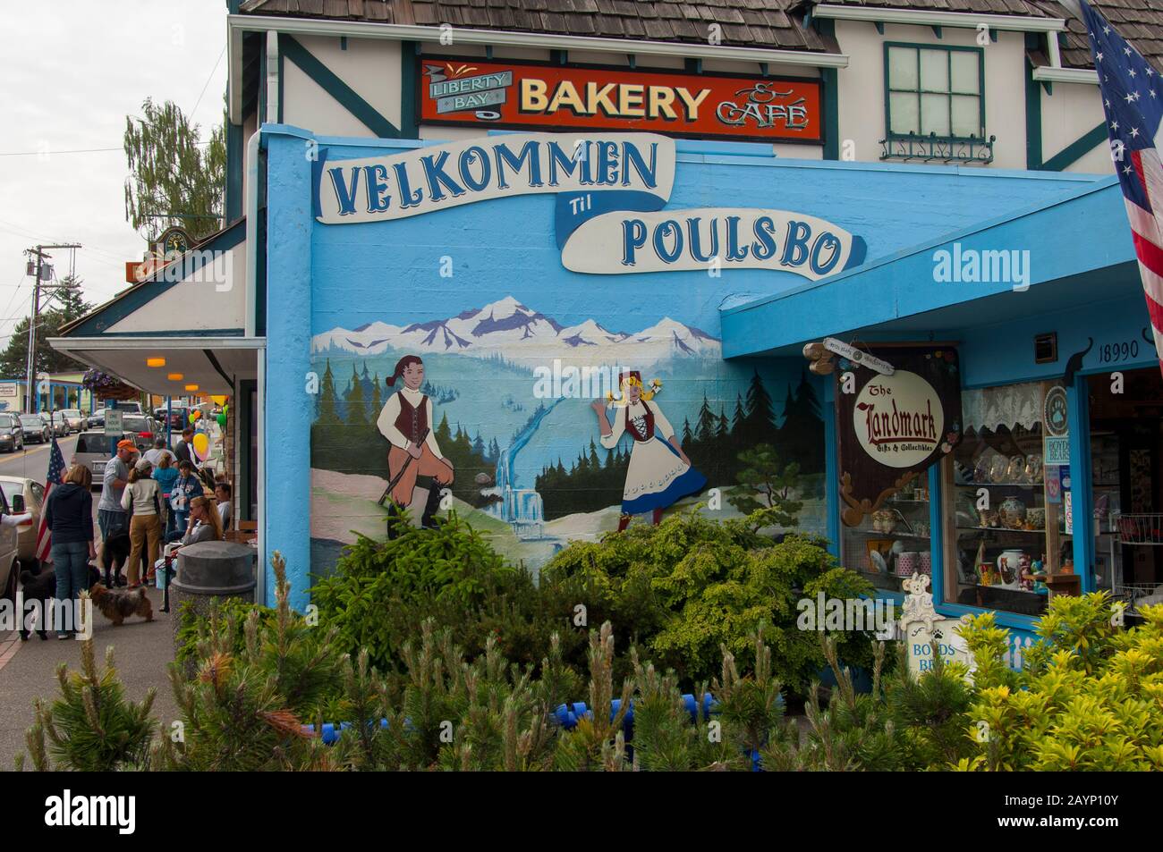 A street scene with a mural on a wall of a bakery in the Scandinavian ...