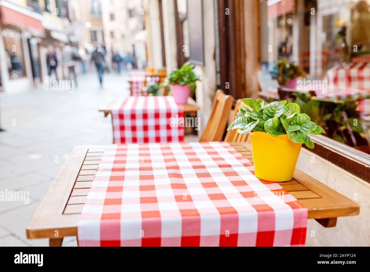 Outdoor table in street cafe Stock Photo - Alamy